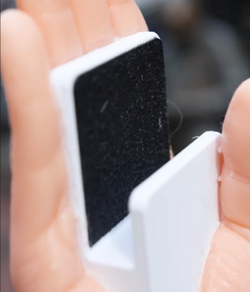 This High-Fashion MacBook Holder Is Shaped Like A Hand