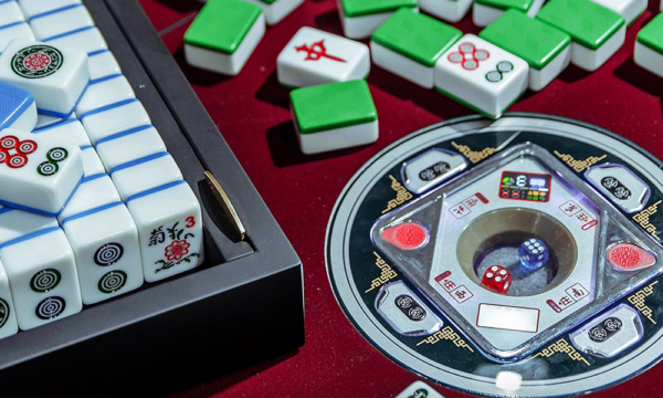 This Luxurious Mahjong Table Comes With USB Ports & Leather Pockets