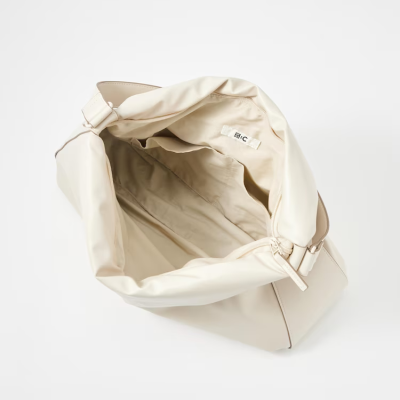 UNIQLO Is Releasing Faux Leather Puffy Bags In 3 Chic Colours